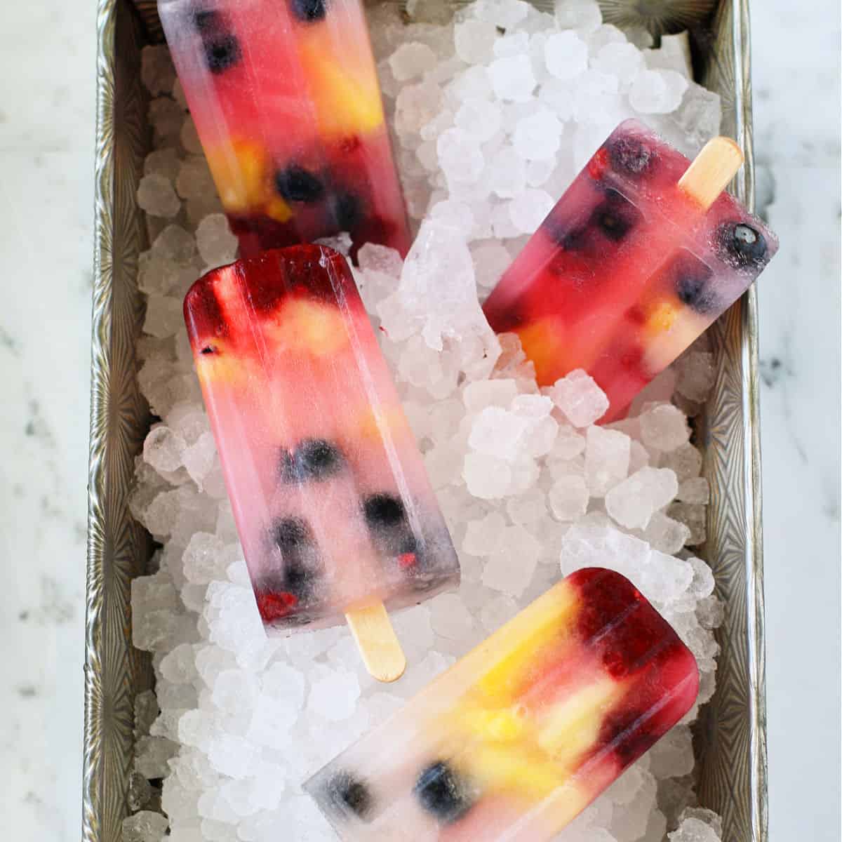 Fruity Lemonade Popsicles. - The Pretty Bee